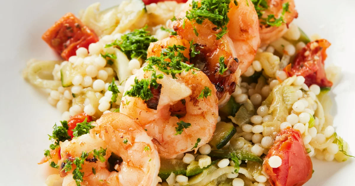 Parelcouscous met scampi, venkel en courgette - Recepten - njam!